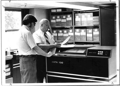 "Steve Adkins & Marvin Fulton operate Marshall's Data 100 terminal" by ...