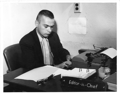 "Editor-in-Chief of the MU Parthenon newspaper, at his manual typewrite ...